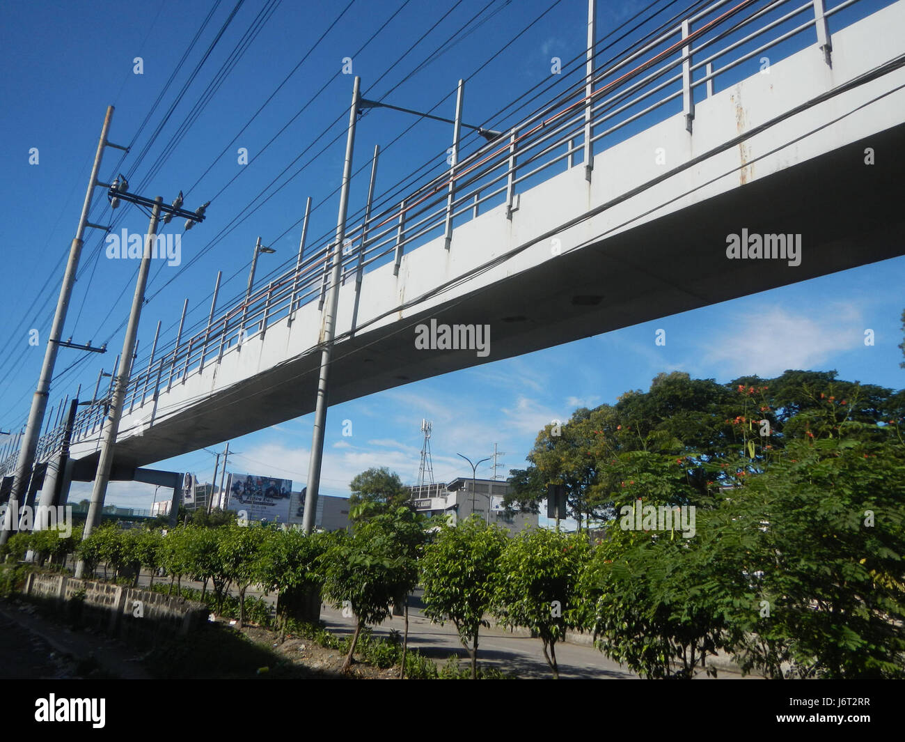 This image shows the footbridge crossing Marcos Highway, connecting the ...