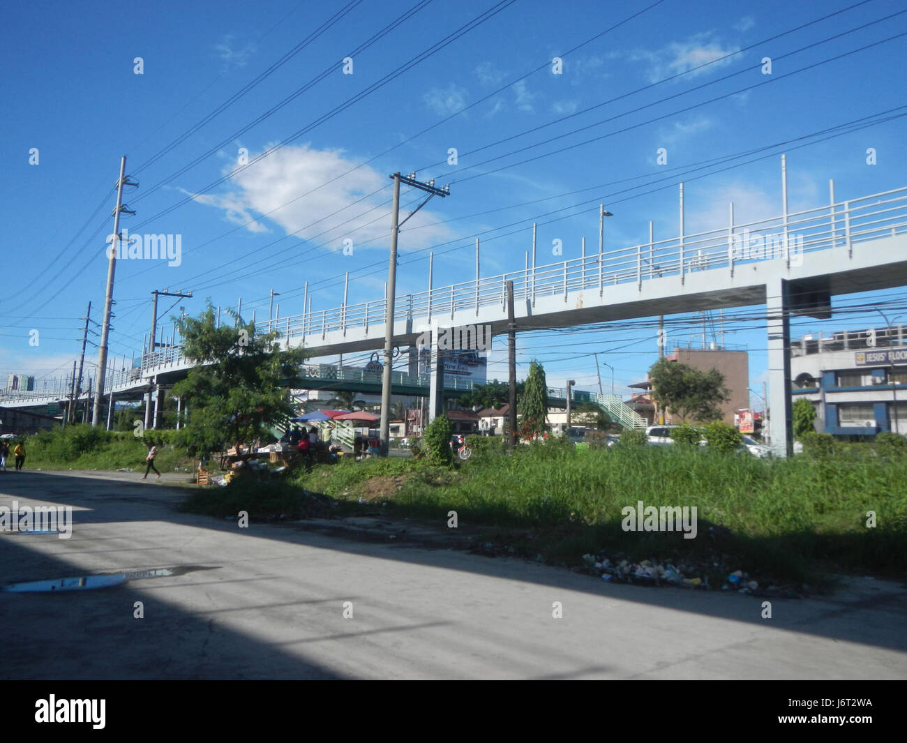 The image features the Footbridge located on Marcos Highway near Pasig ...