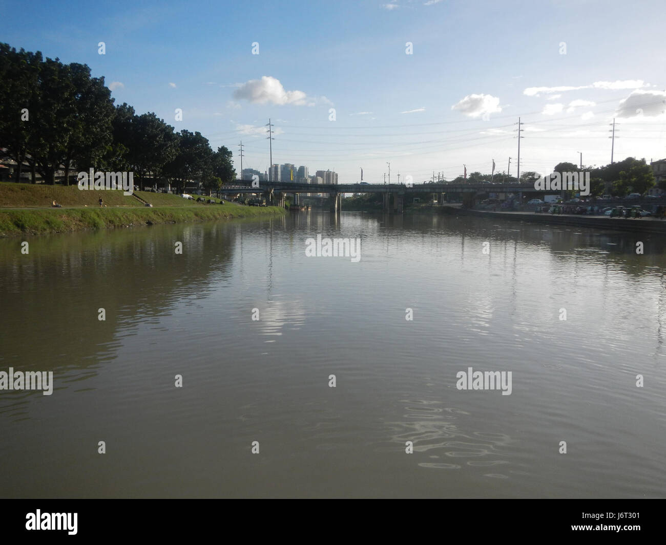 This image captures a view of the LRT Line 17, including the Marcos ...
