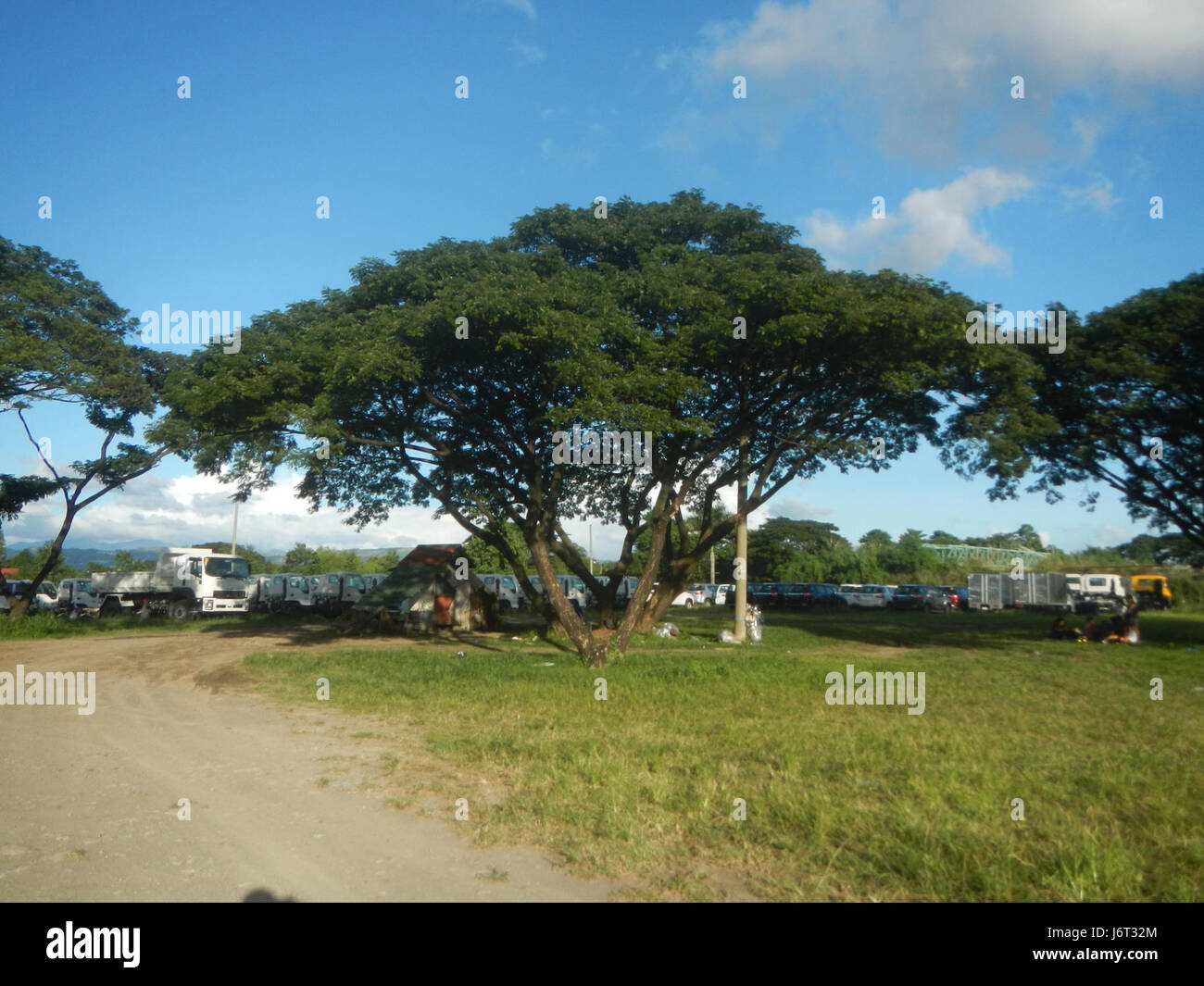 This image depicts a section of the LRT Line 26 at Barangka, passing ...