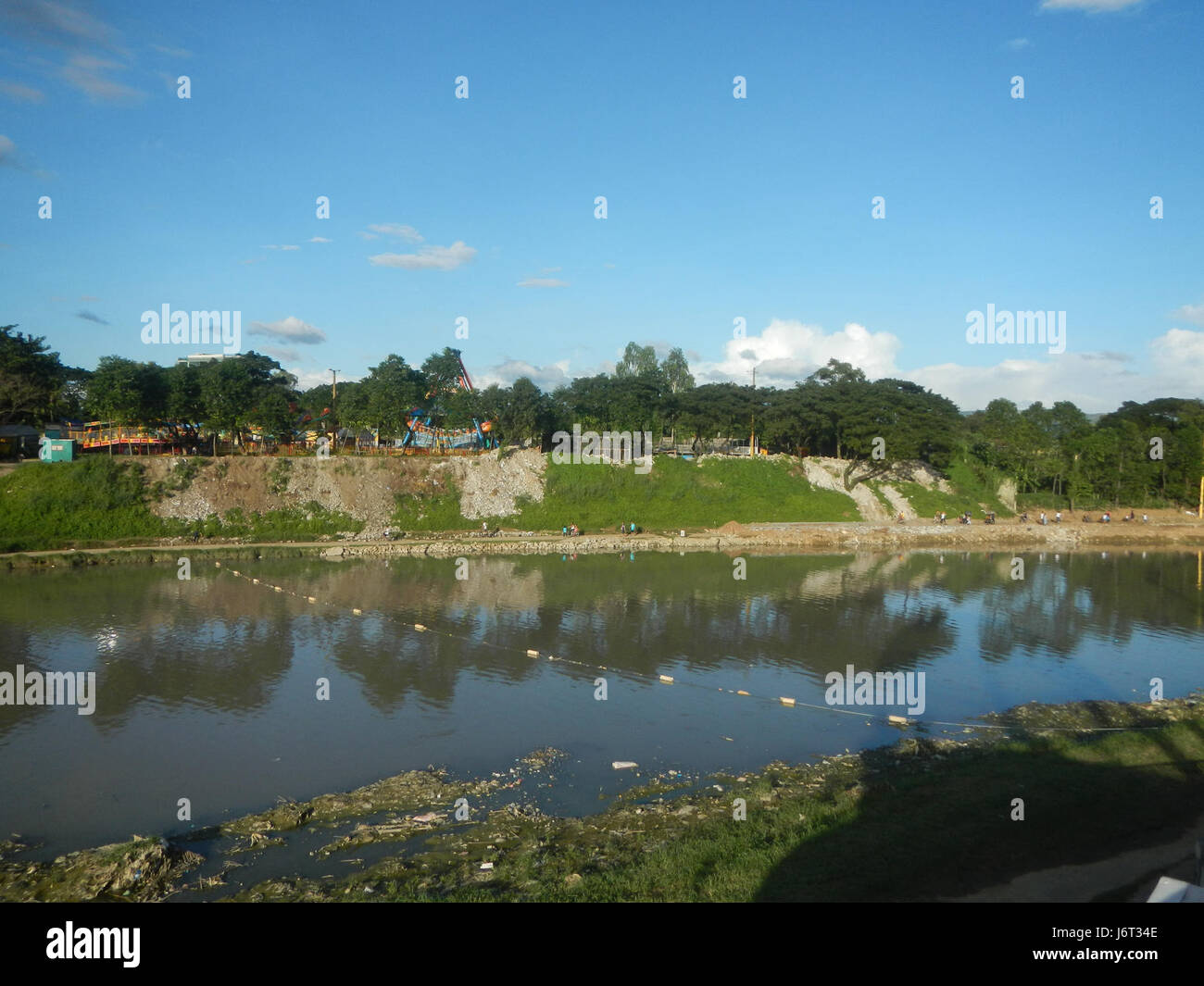 This image captures the Marikina River Park in the Philippines ...