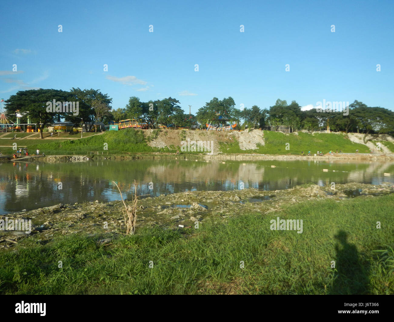This image shows the banks of the Marikina River Park, located near the ...