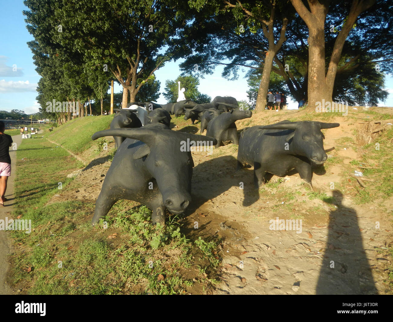 The Marikina River Park in the Philippines features statues of carabaos ...