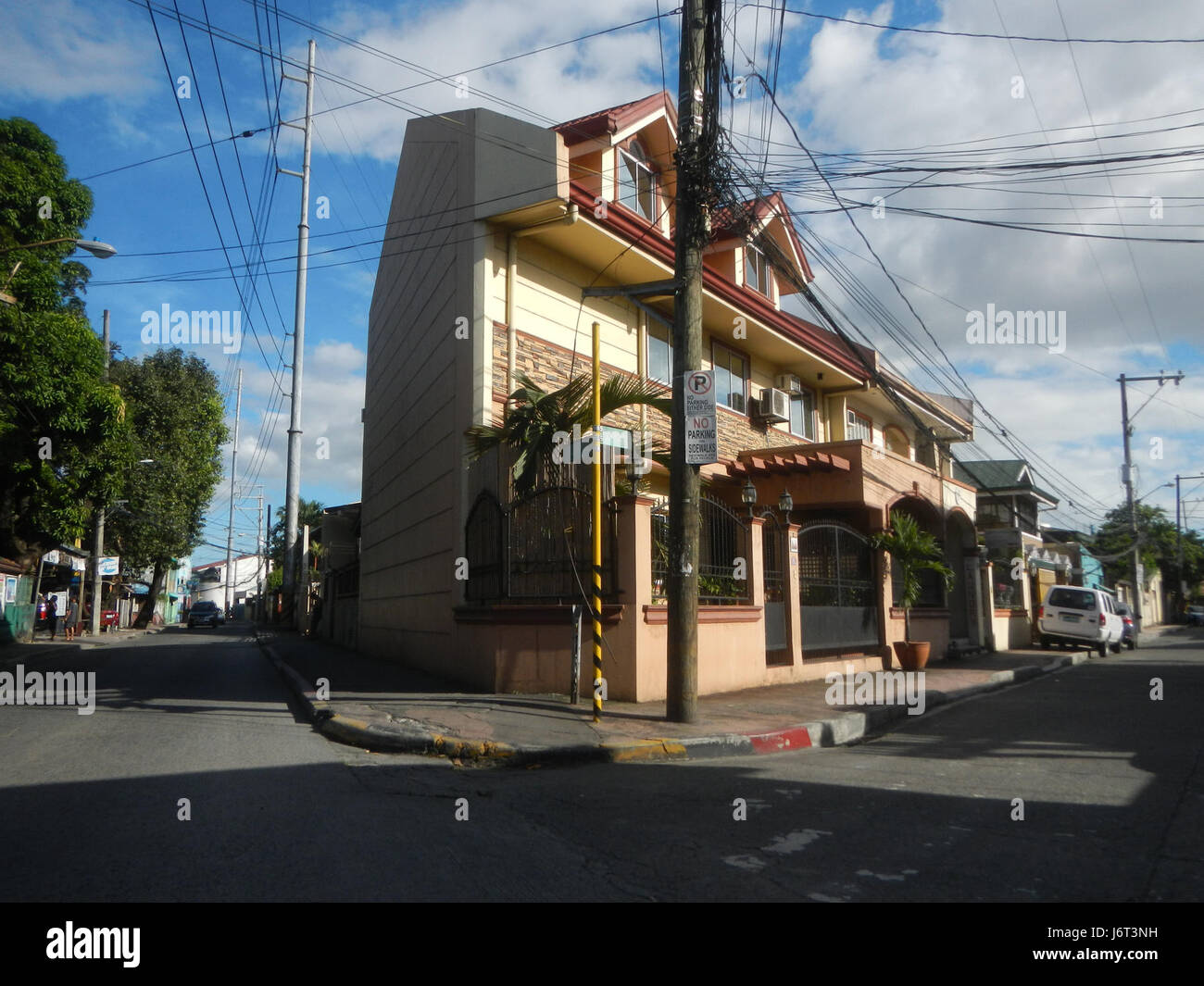 This image captures the streets and buildings of Calumpang, a district ...