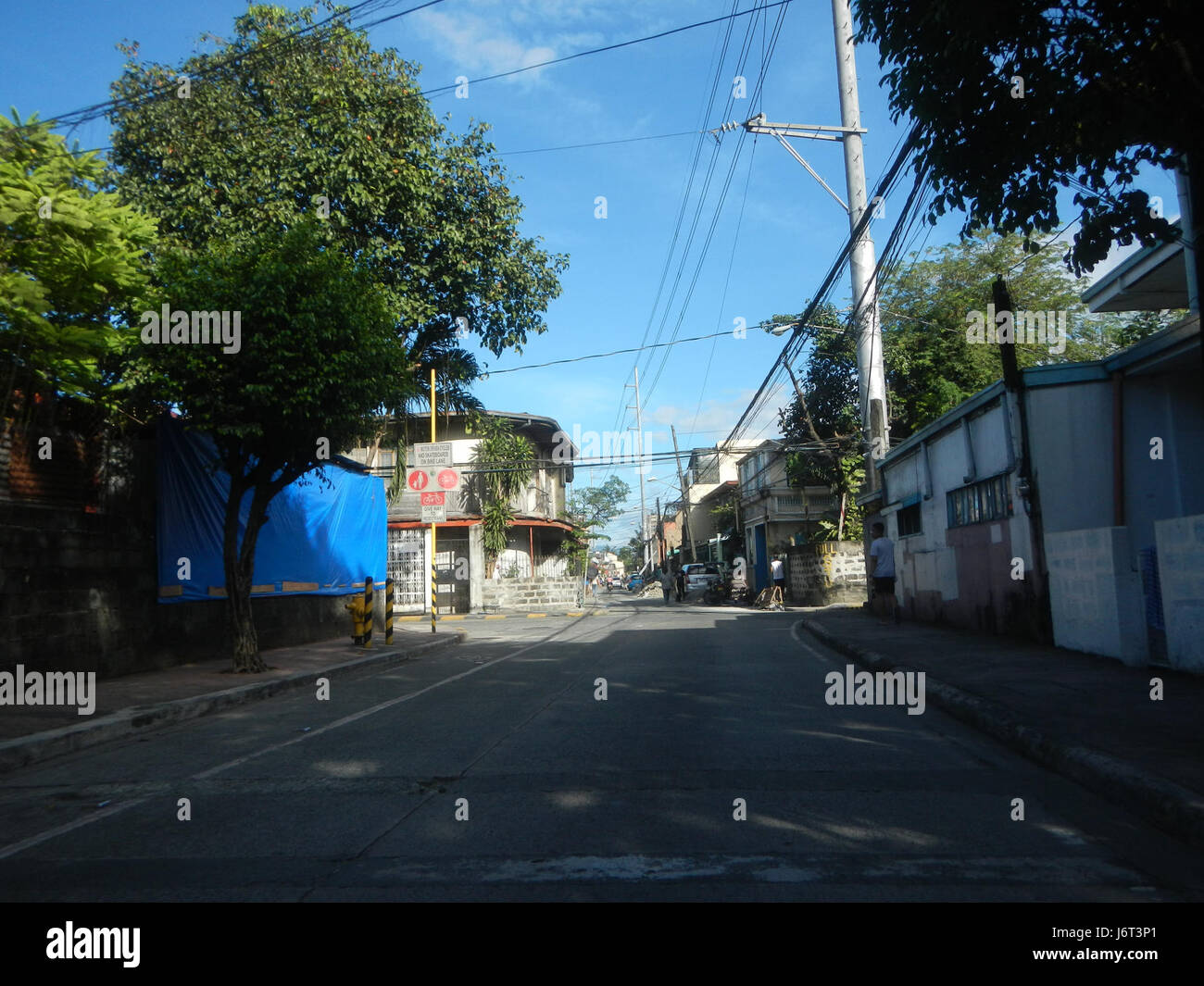 This image shows the streets and buildings of Calumpang along Marcos ...