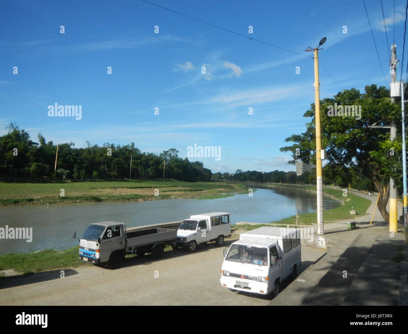 This image showcases the streets and buildings of Calumpang, part of ...