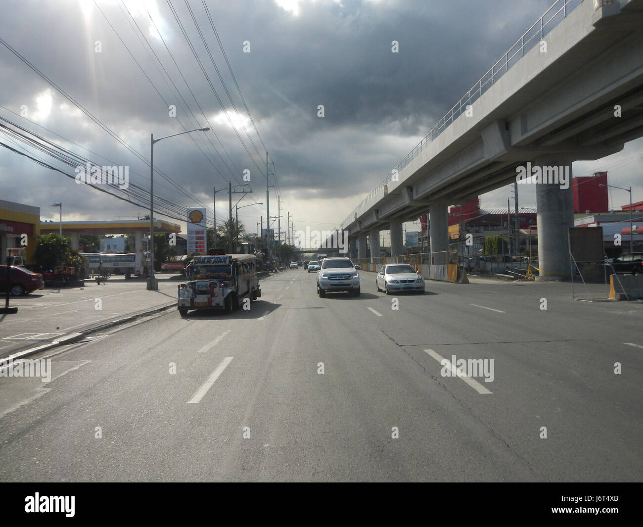 An image of the landscape showing the Manila MRT Line 6, with stations ...