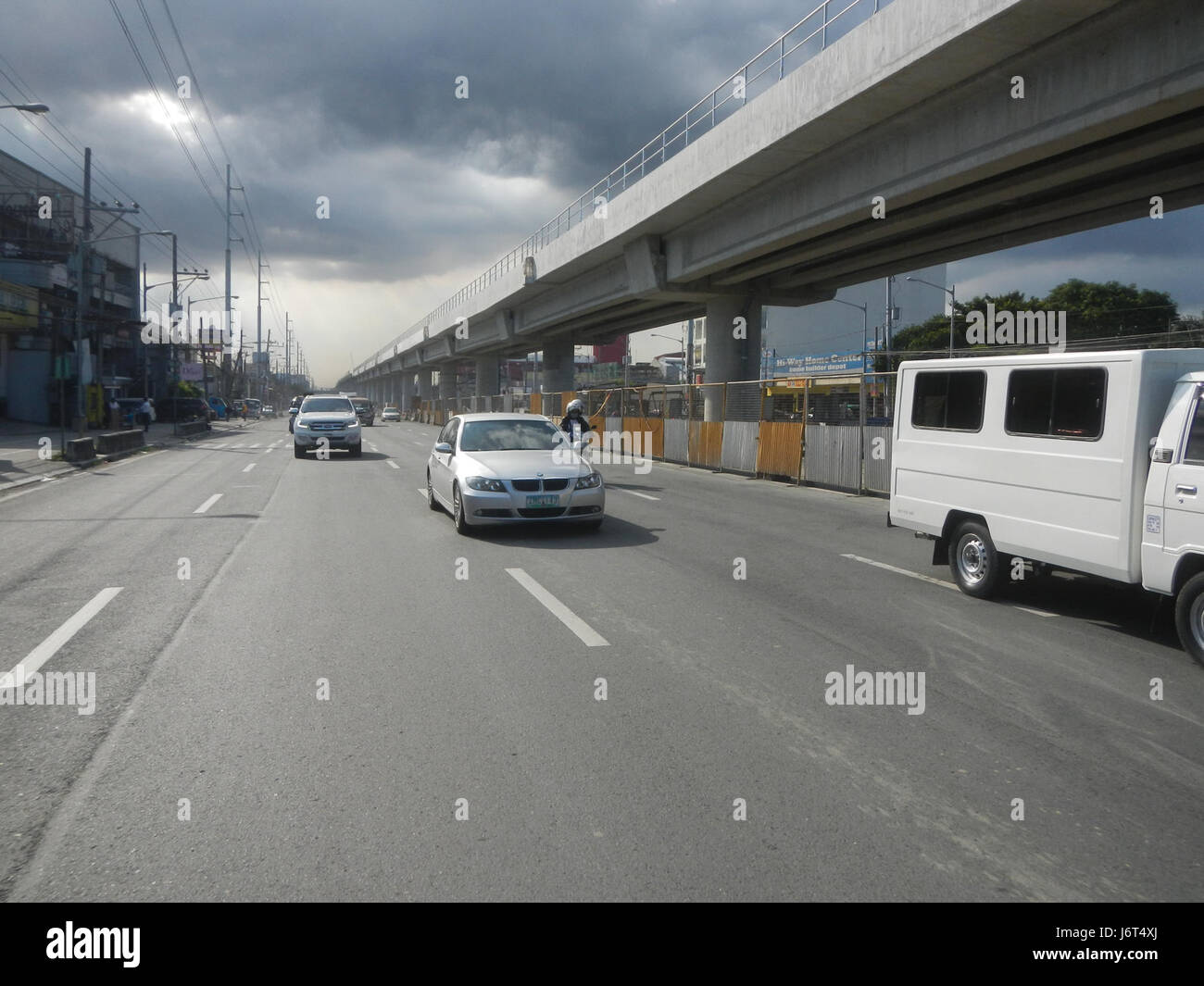 This image shows a landscape of the Manila MRT Line 11, including the ...