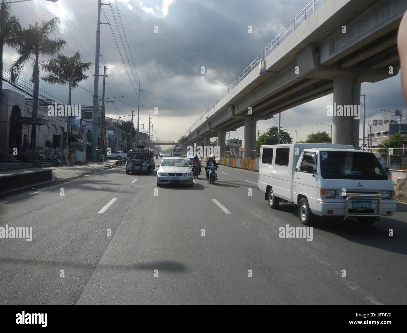 A photograph showing the landscape of the Manila MRT Line 21, which ...