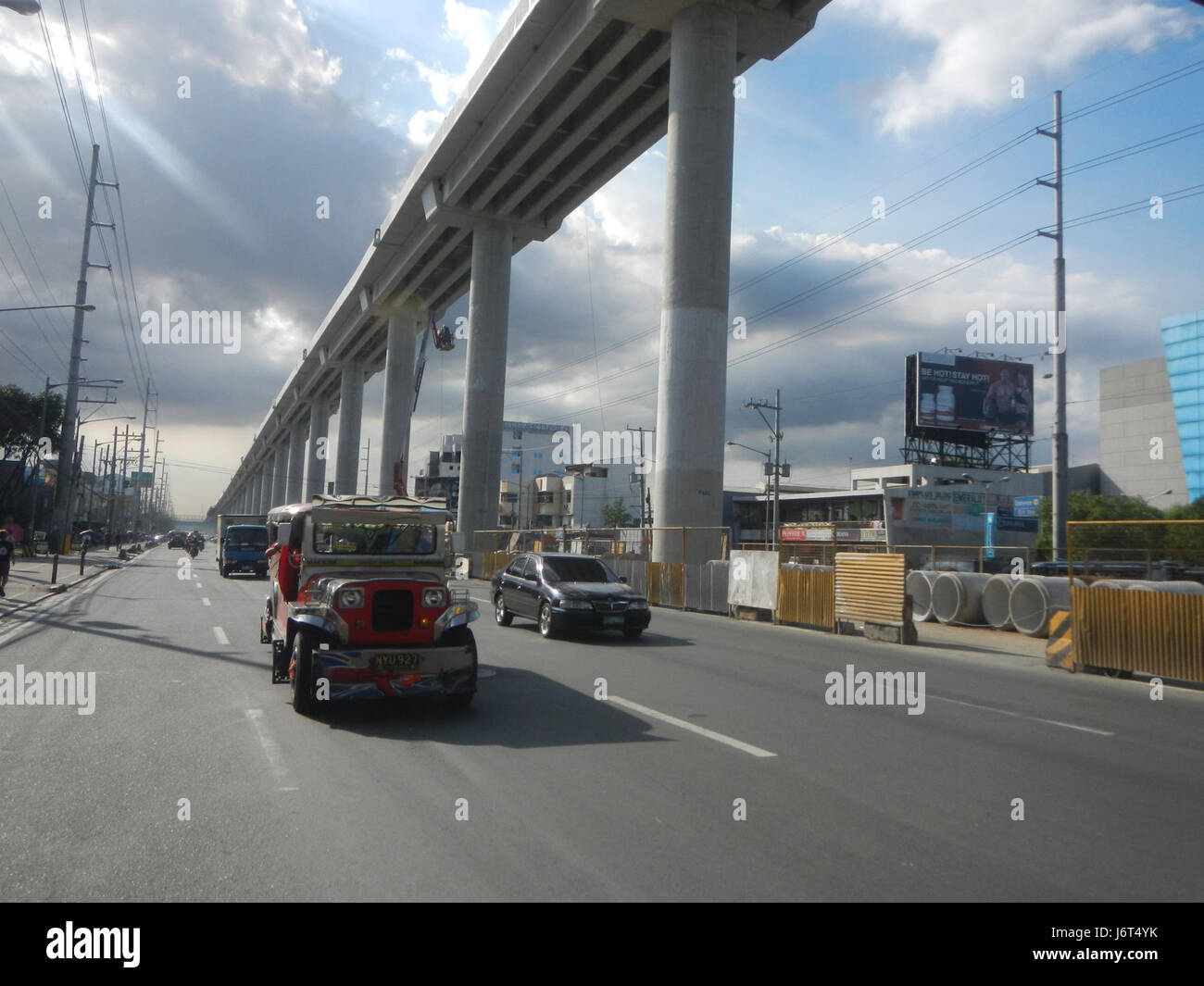 The landscape of the Manila MRT Line 14 is depicted in this image ...