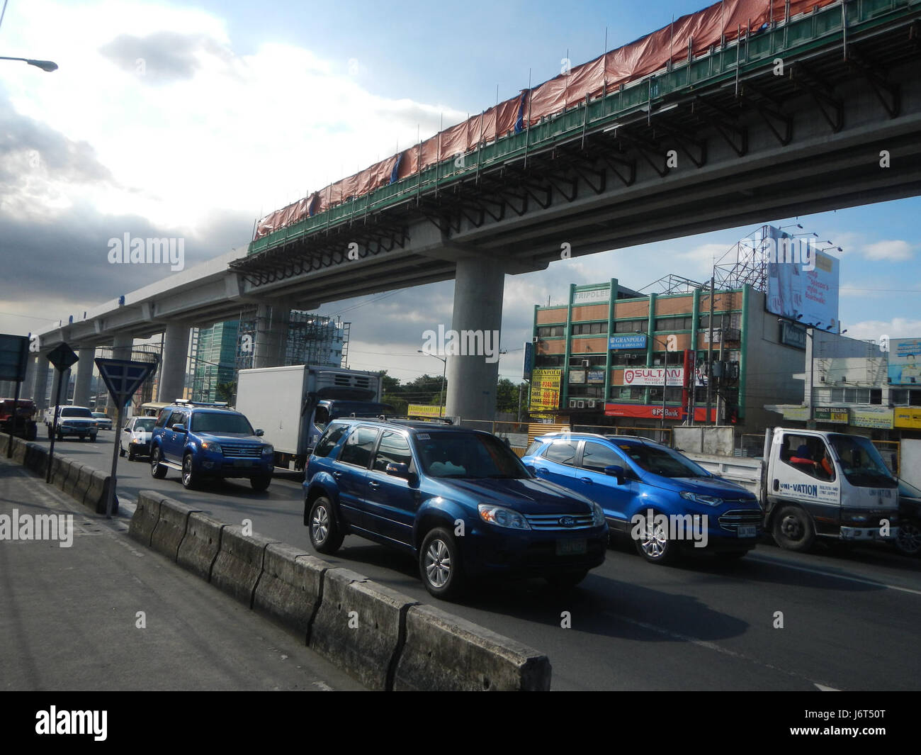 A photograph of the pedestrian footbridge connecting Masinag and ...