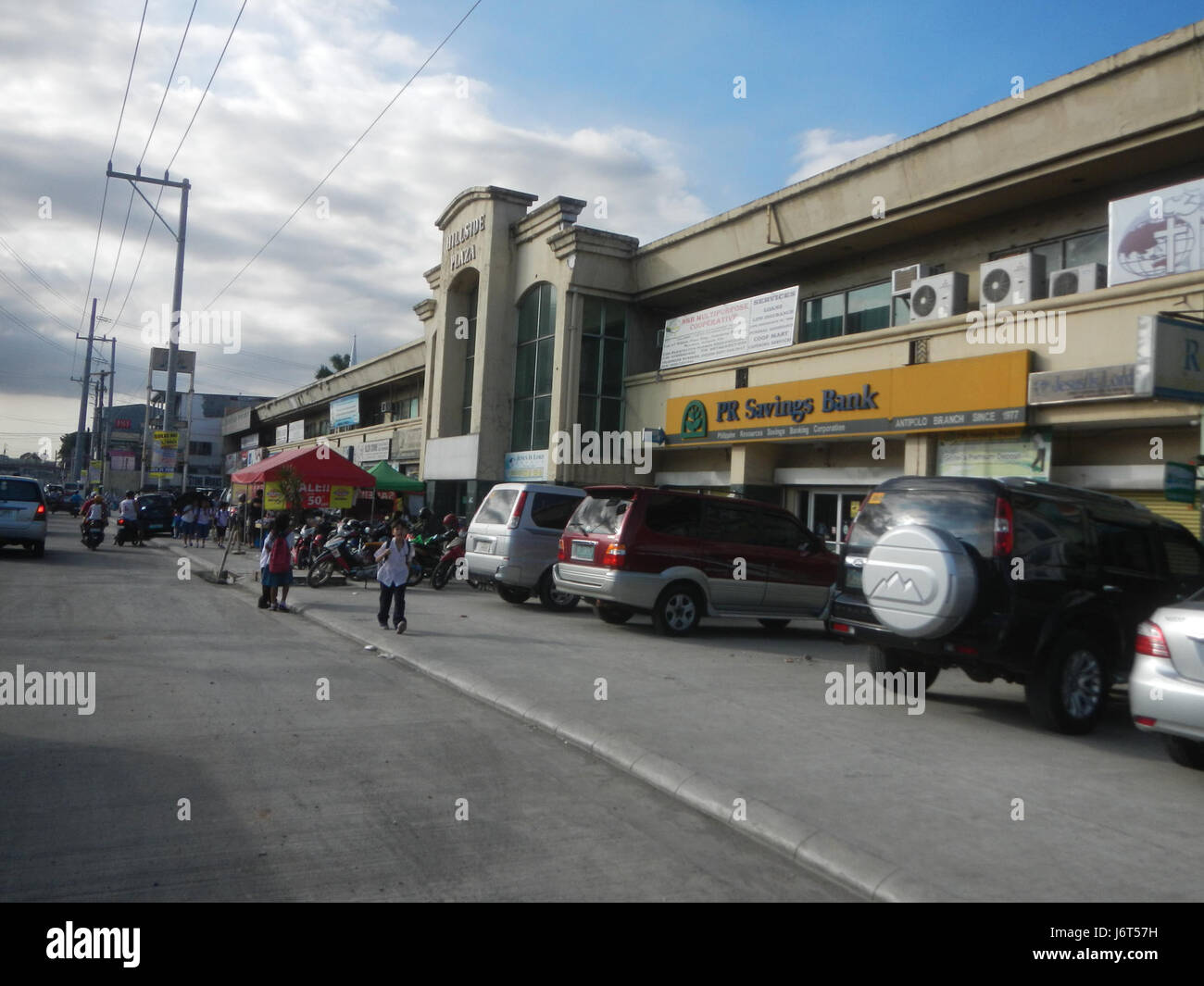 Photograph showing churches and buildings along the Sumulong Highway in ...
