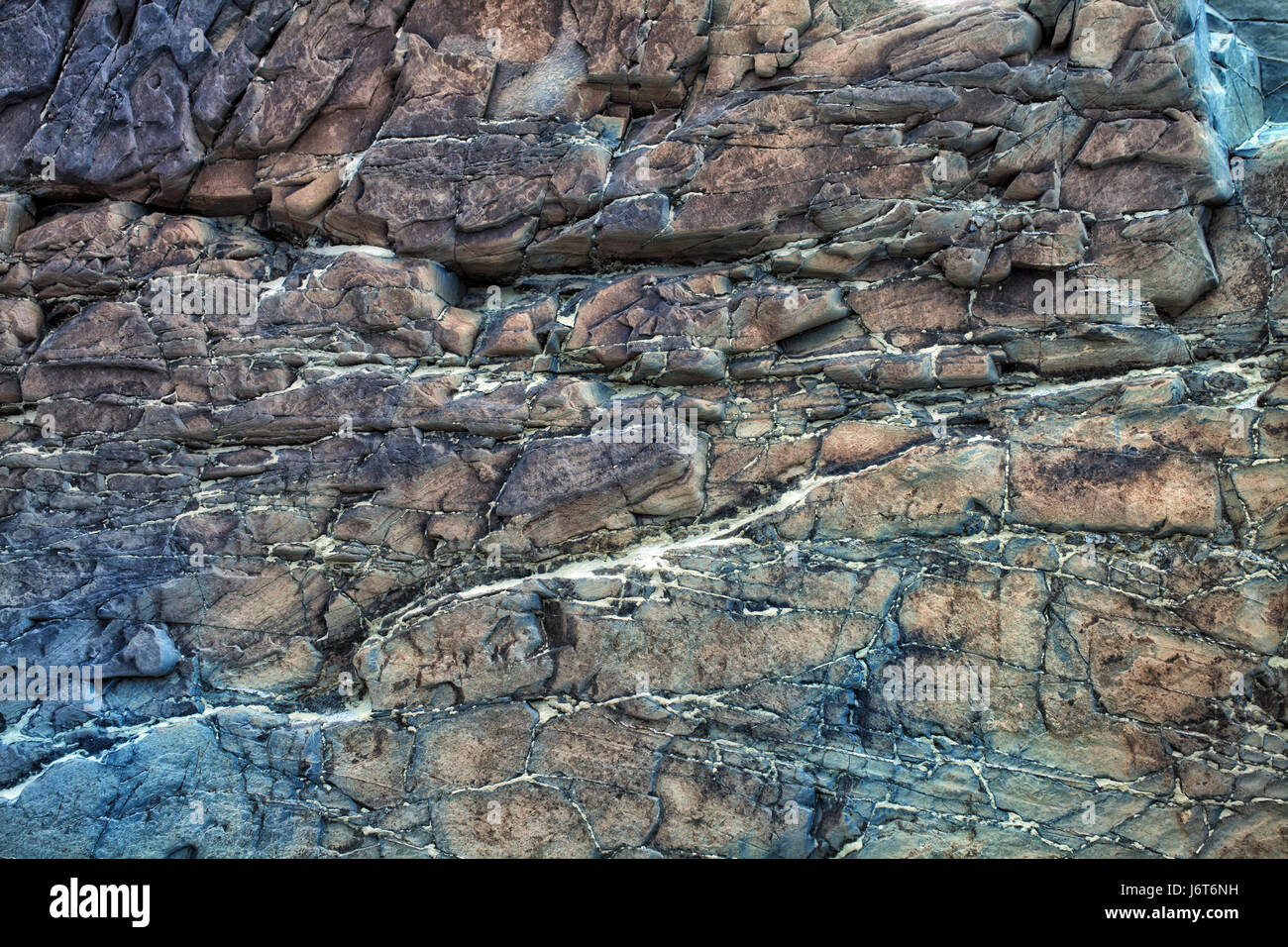 Stone bright multi-colored texture of natural rock Stock Photo - Alamy