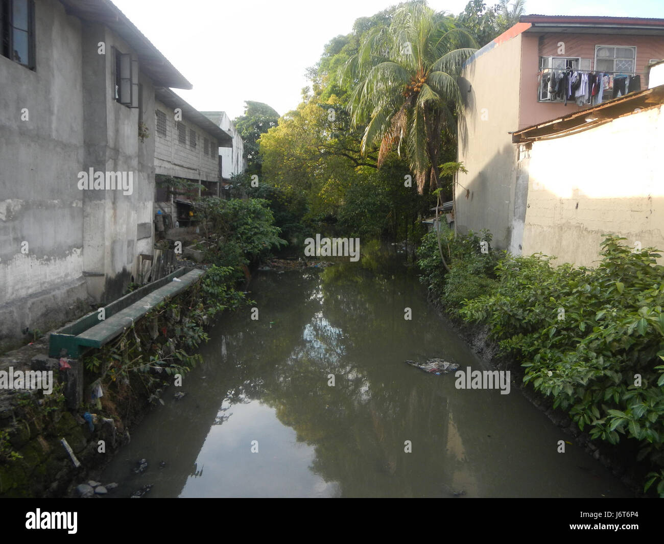 This image shows the General Kalentong Street Bridge over a creek in ...