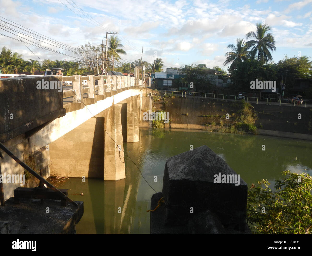 A scenic view of the sunset at the San Miguel Bridge over the San Juan ...