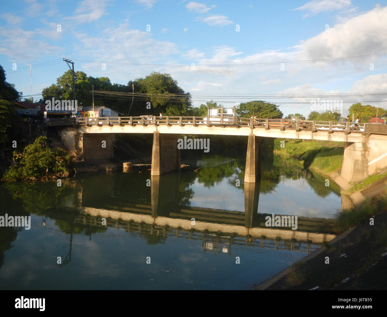 The sunsets over San Miguel Bridge, situated on the River San Juan in ...