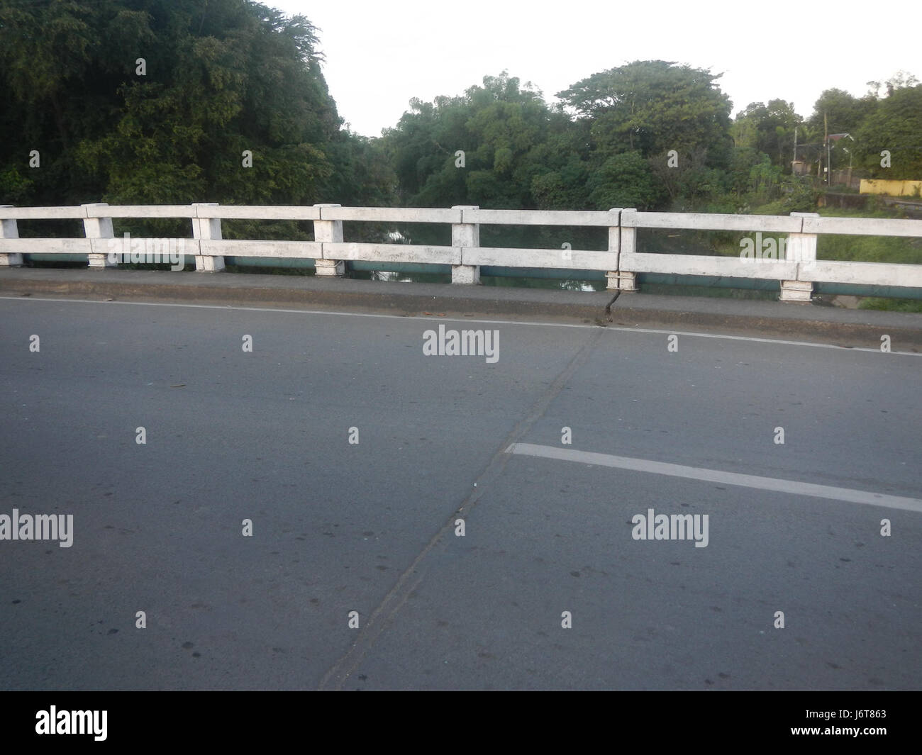 This image captures a stunning sunset over San Miguel Bridge, located ...