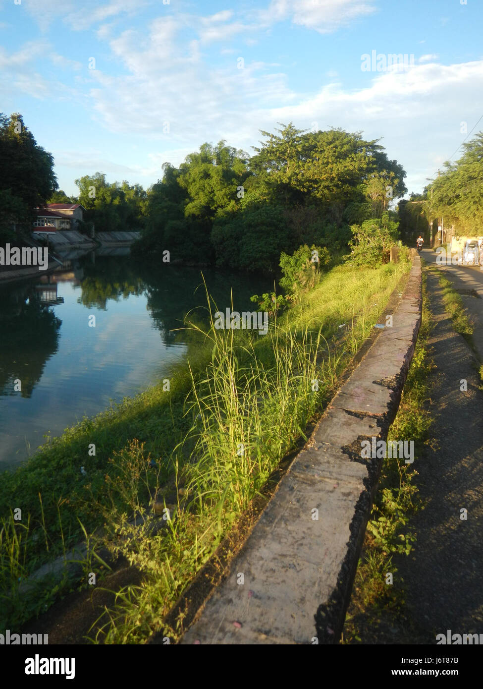 This image captures the serene sunset over the San Miguel Bridge ...