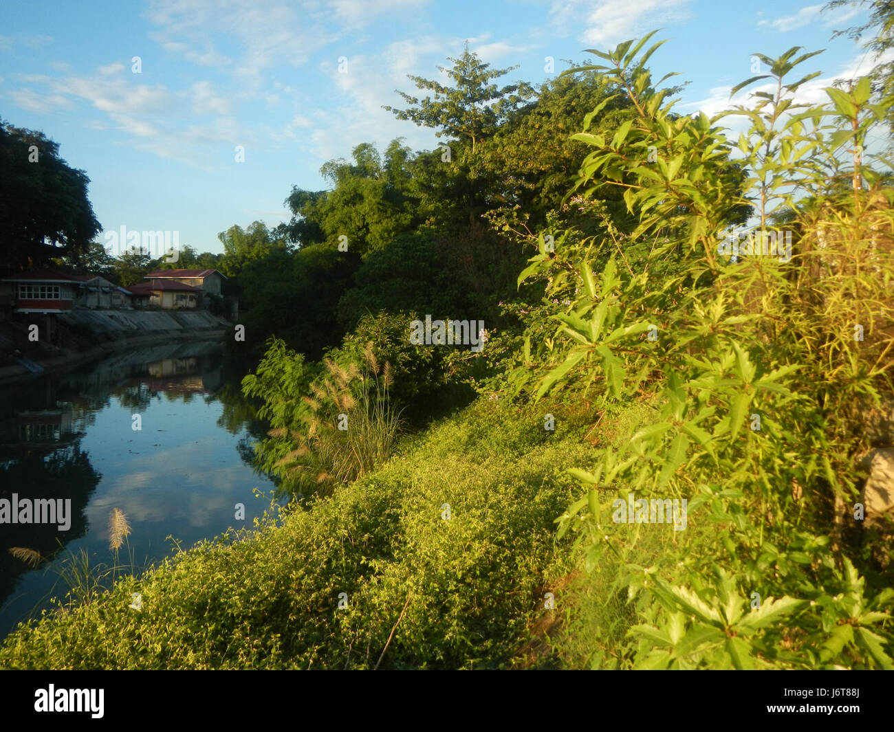 This view captures a sunset over the San Miguel Bridge, spanning the ...
