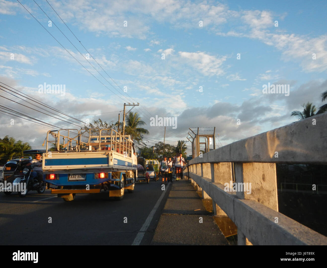 A picturesque sunset view of the San Miguel Bridge over the San Juan ...