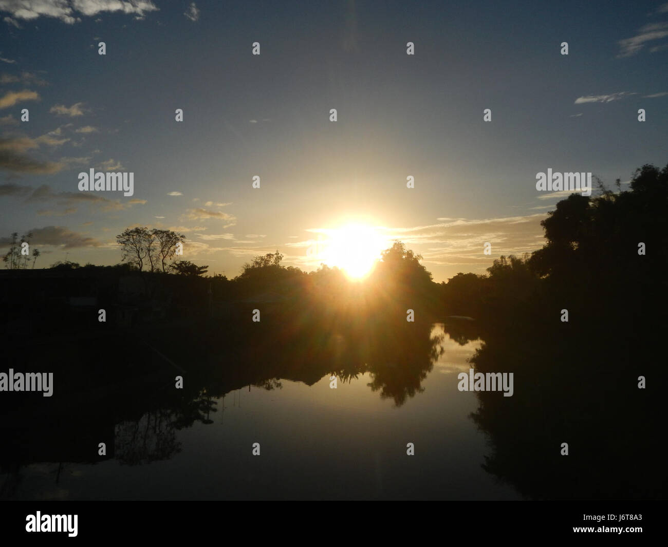 The photograph captures a stunning sunset view over the San Miguel ...