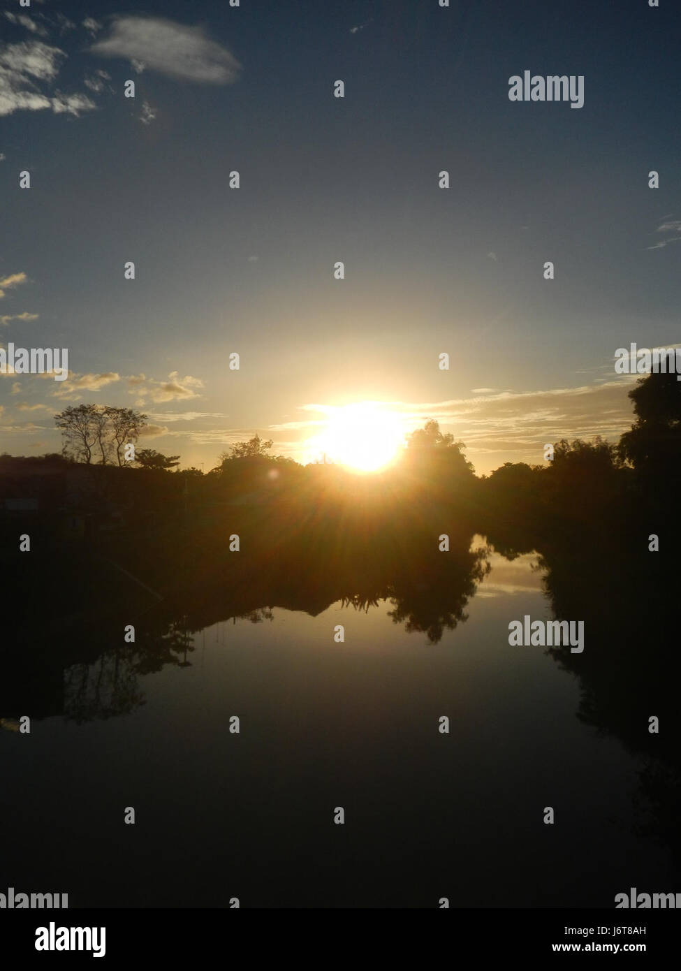 The photograph captures a sunset view from San Miguel Bridge, crossing ...