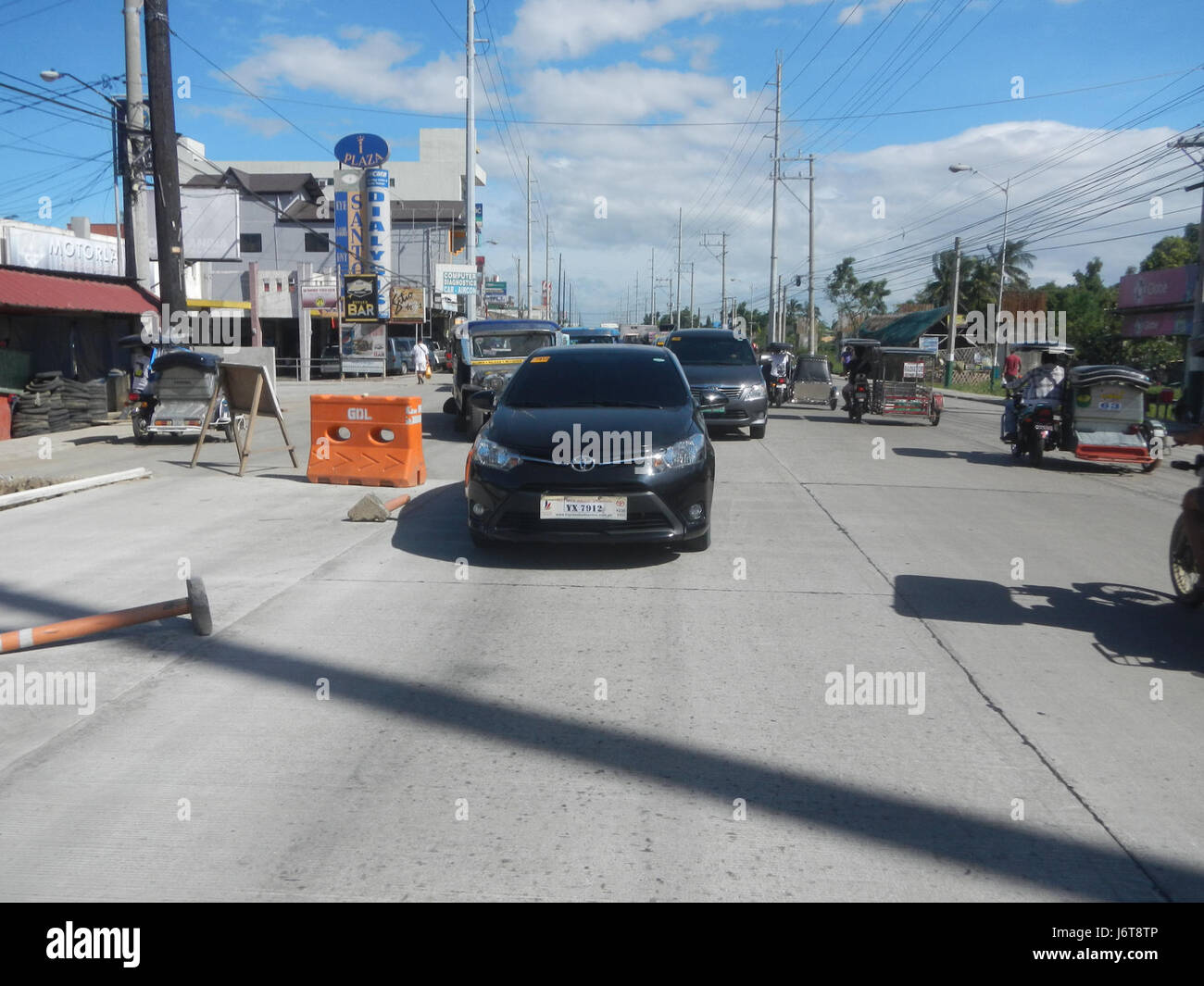 This image shows a section of MacArthur Highway passing through Malolos ...