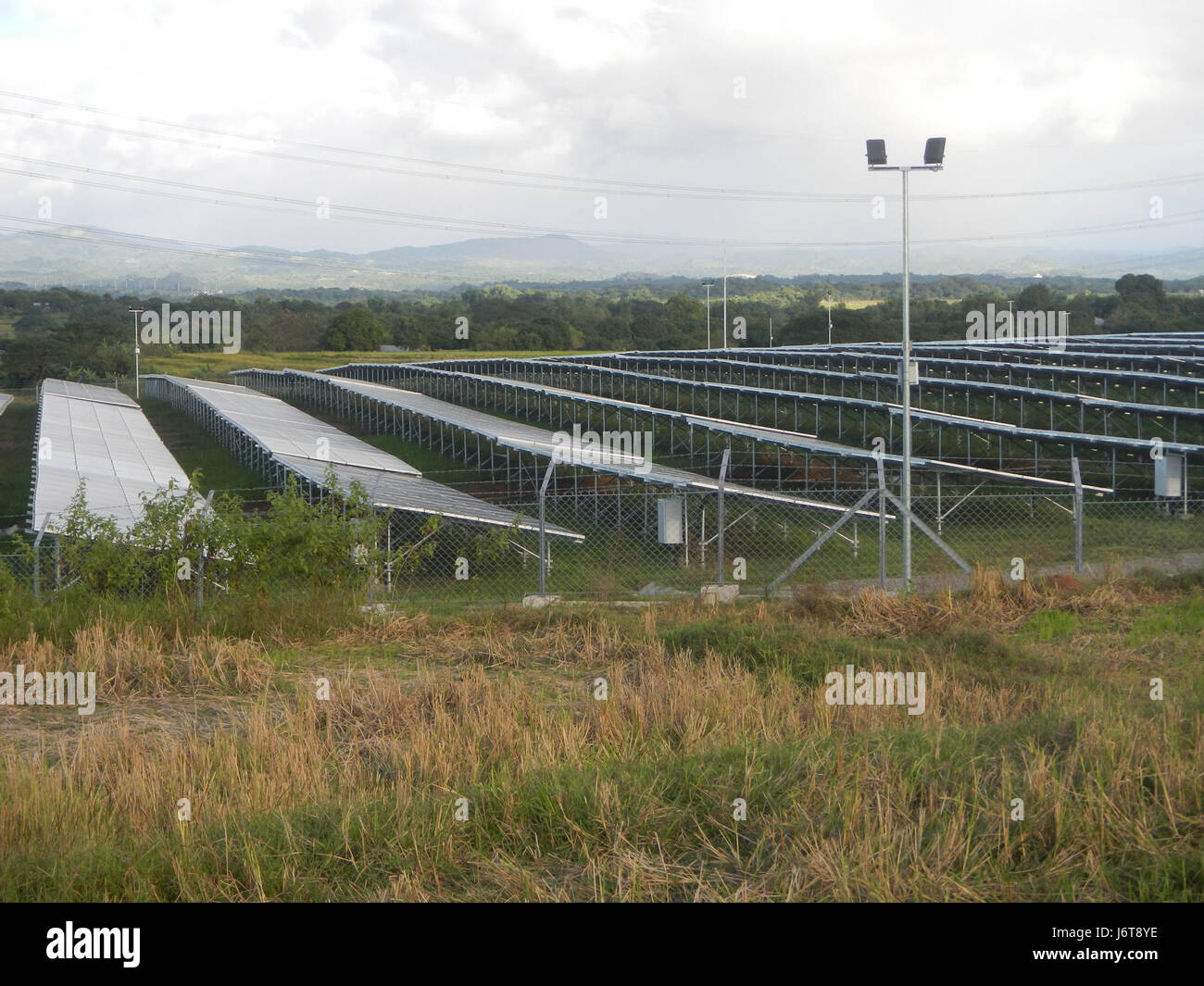 The image depicts the paddy fields of Pasong Inchik in San Rafael ...