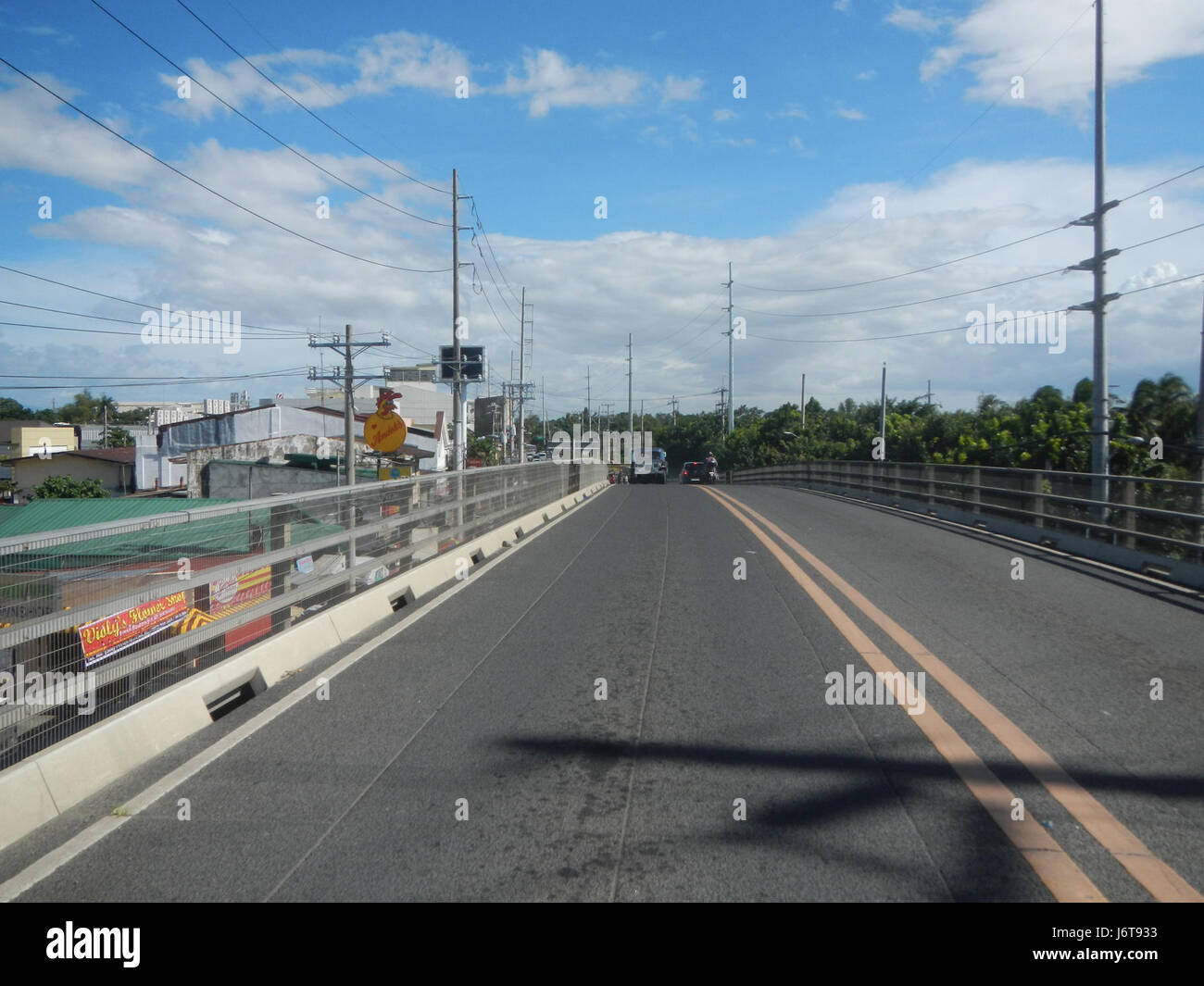 This image captures the MacArthur Highway running through Malolos and ...