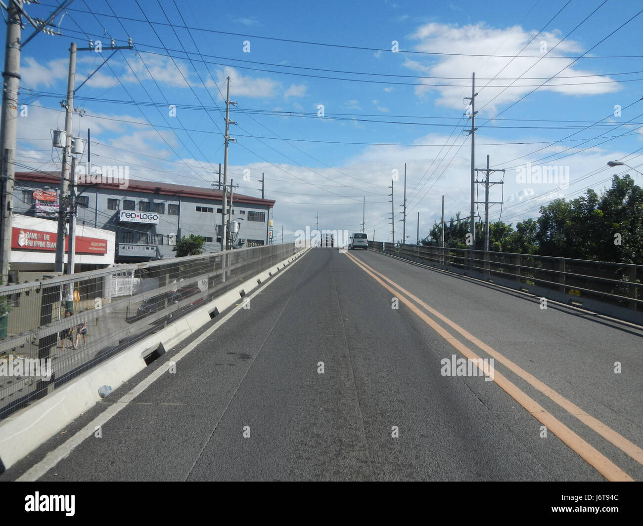 This image shows the MacArthur Highway passing through the Malolos and ...