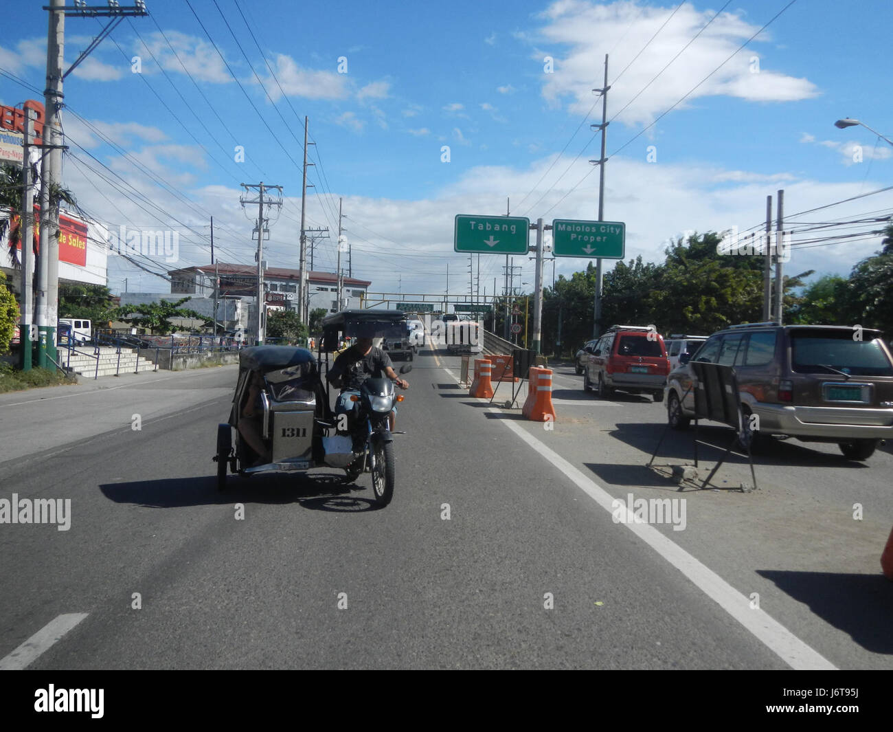 The MacArthur Highway section in Malolos and Guiguinto, Bulacan, is a ...