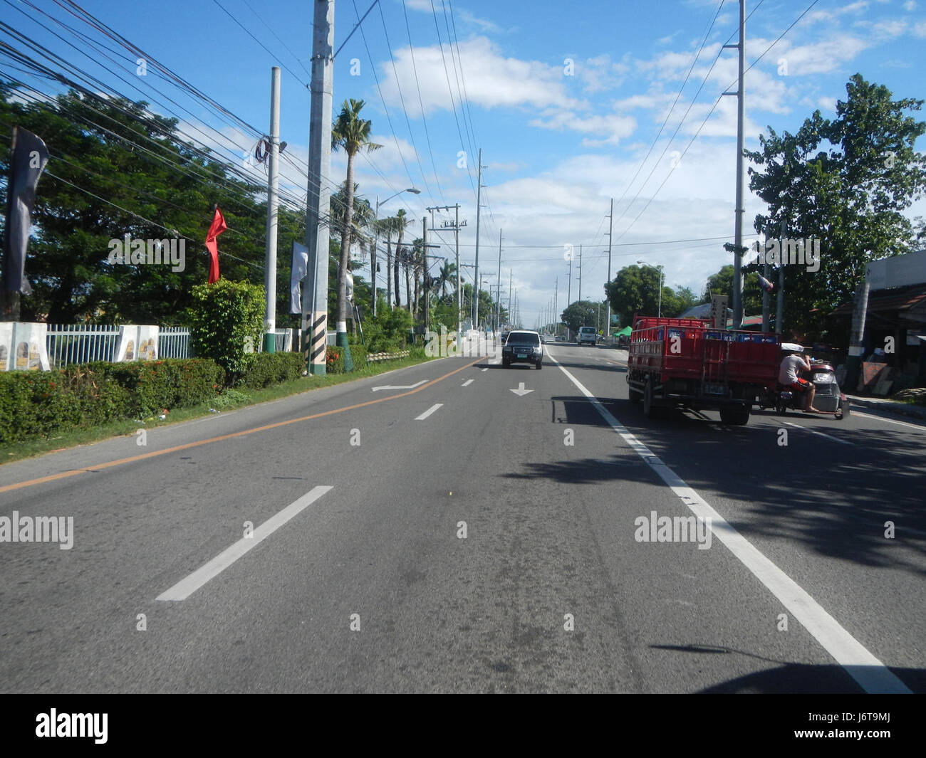 This image shows MacArthur Highway, located in the provinces of Malolos ...