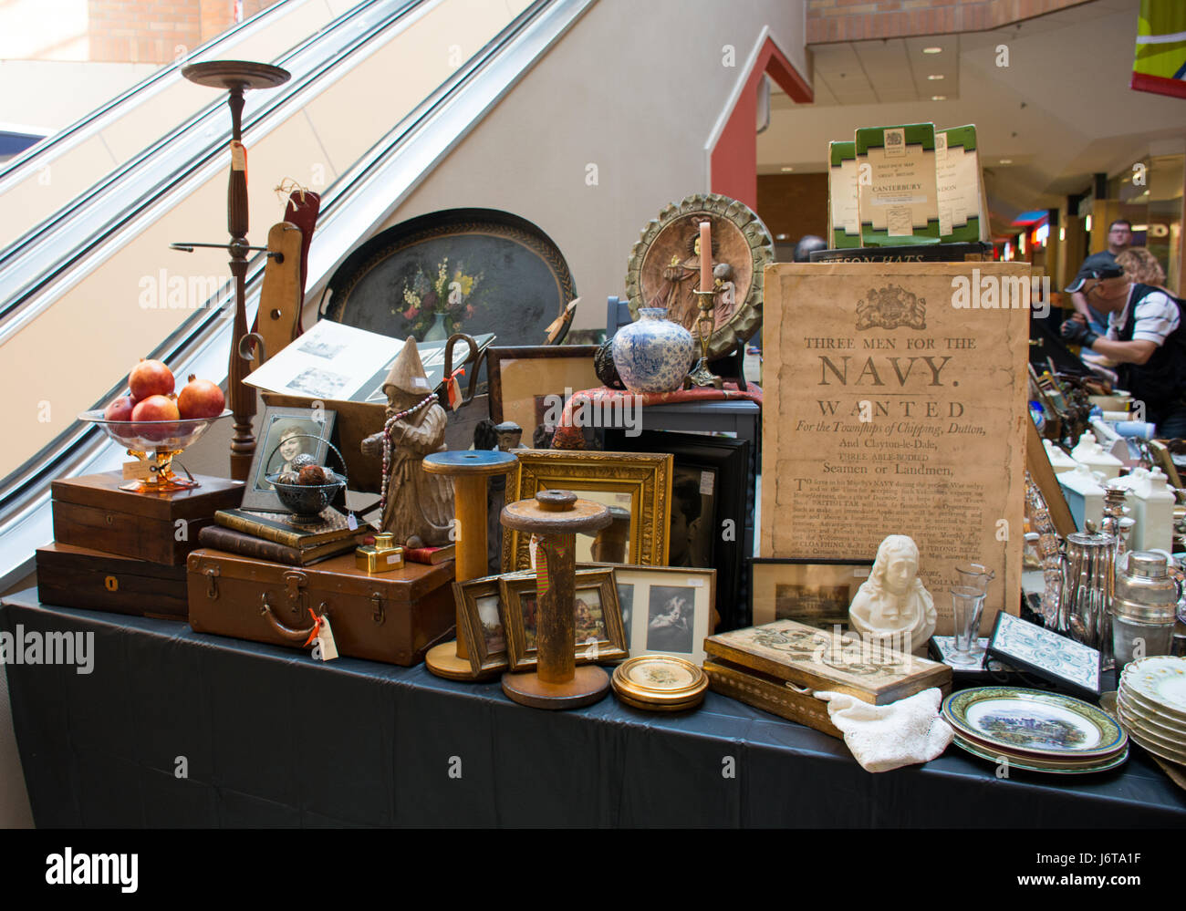Navy Recruiting Sign on Antique Dealers Table Stock Photo - Alamy
