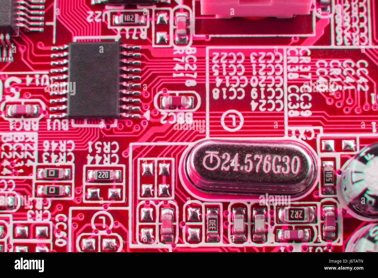 Chip on motherboard mainboard with controllers, ports and wires, close ...