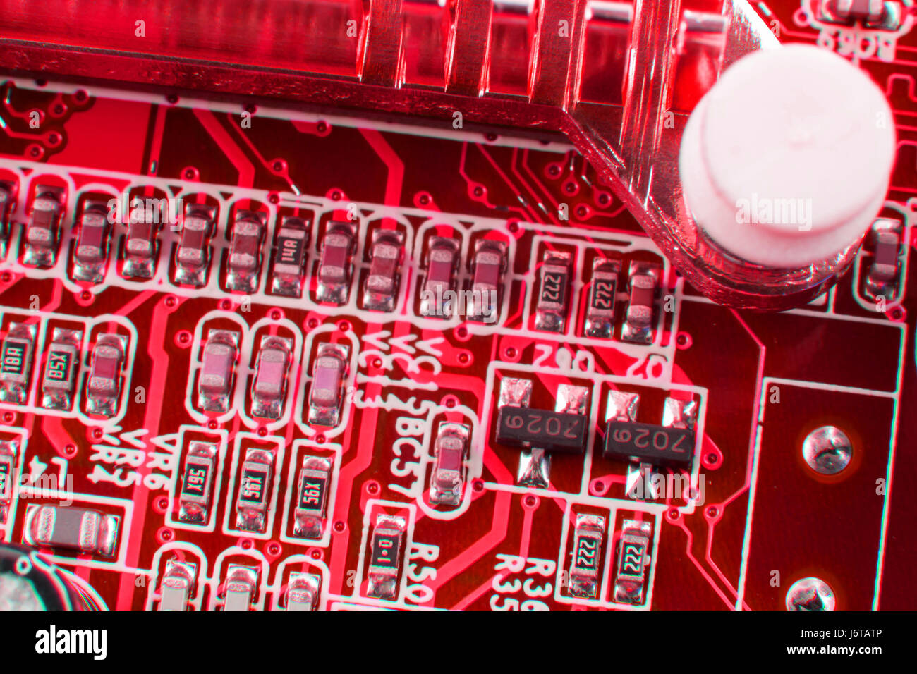 Chip on motherboard mainboard with controllers, ports and wires, close ...