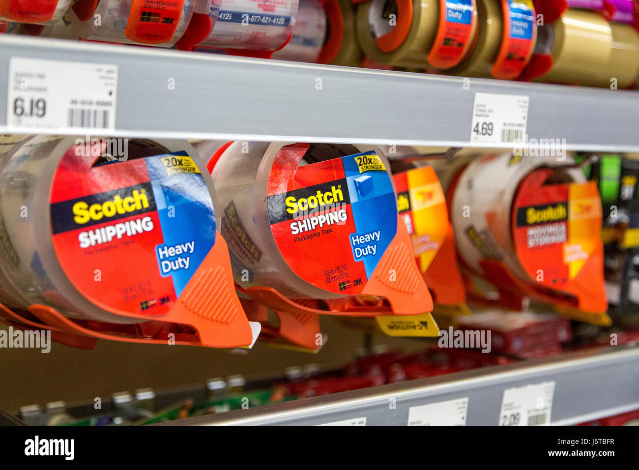 Scotch brand heavy duty clear packing tape rolls on display at a store ...