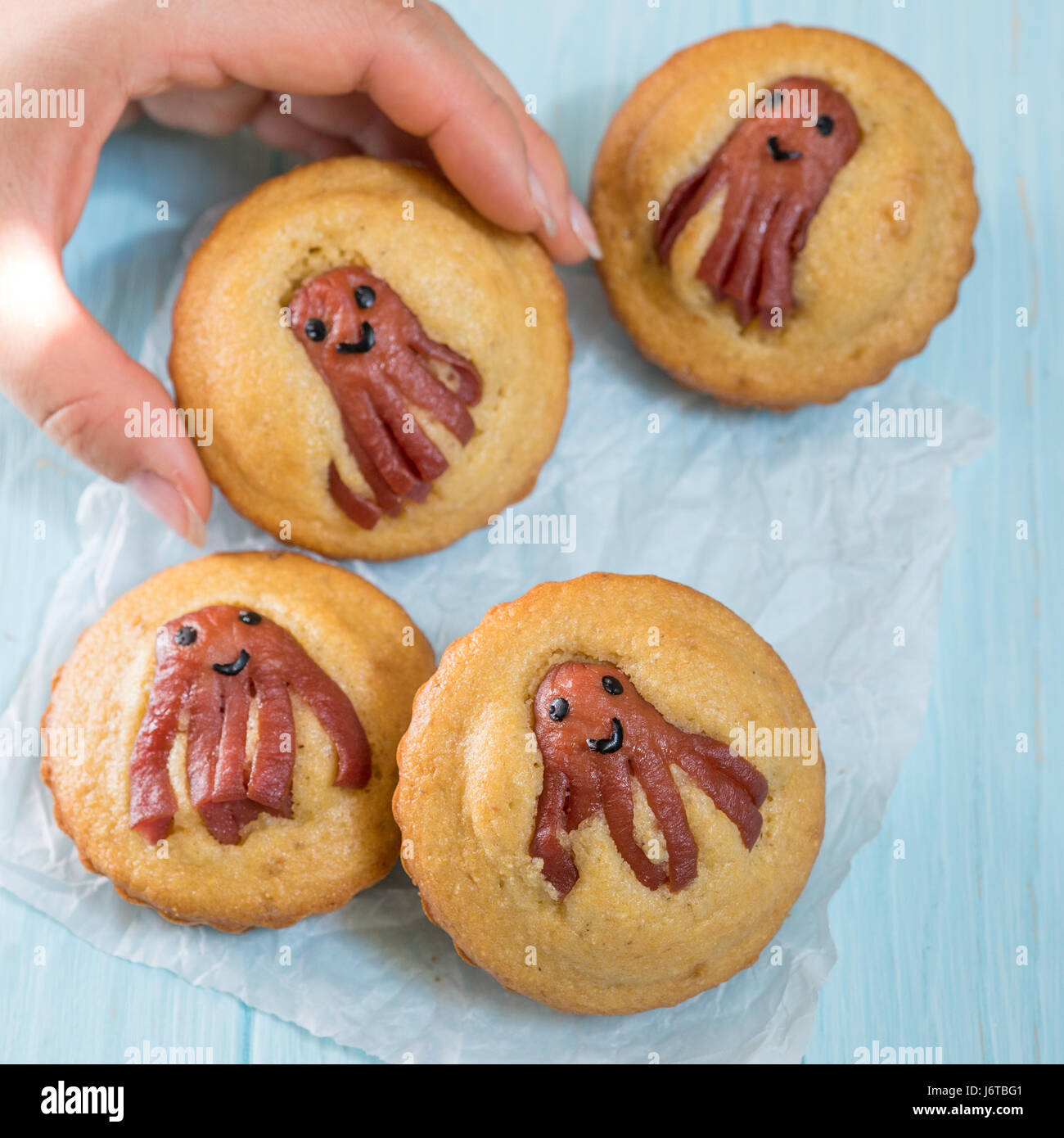 Kid funny food. Cornbread corn dogs muffins with cute octopus sausage ...