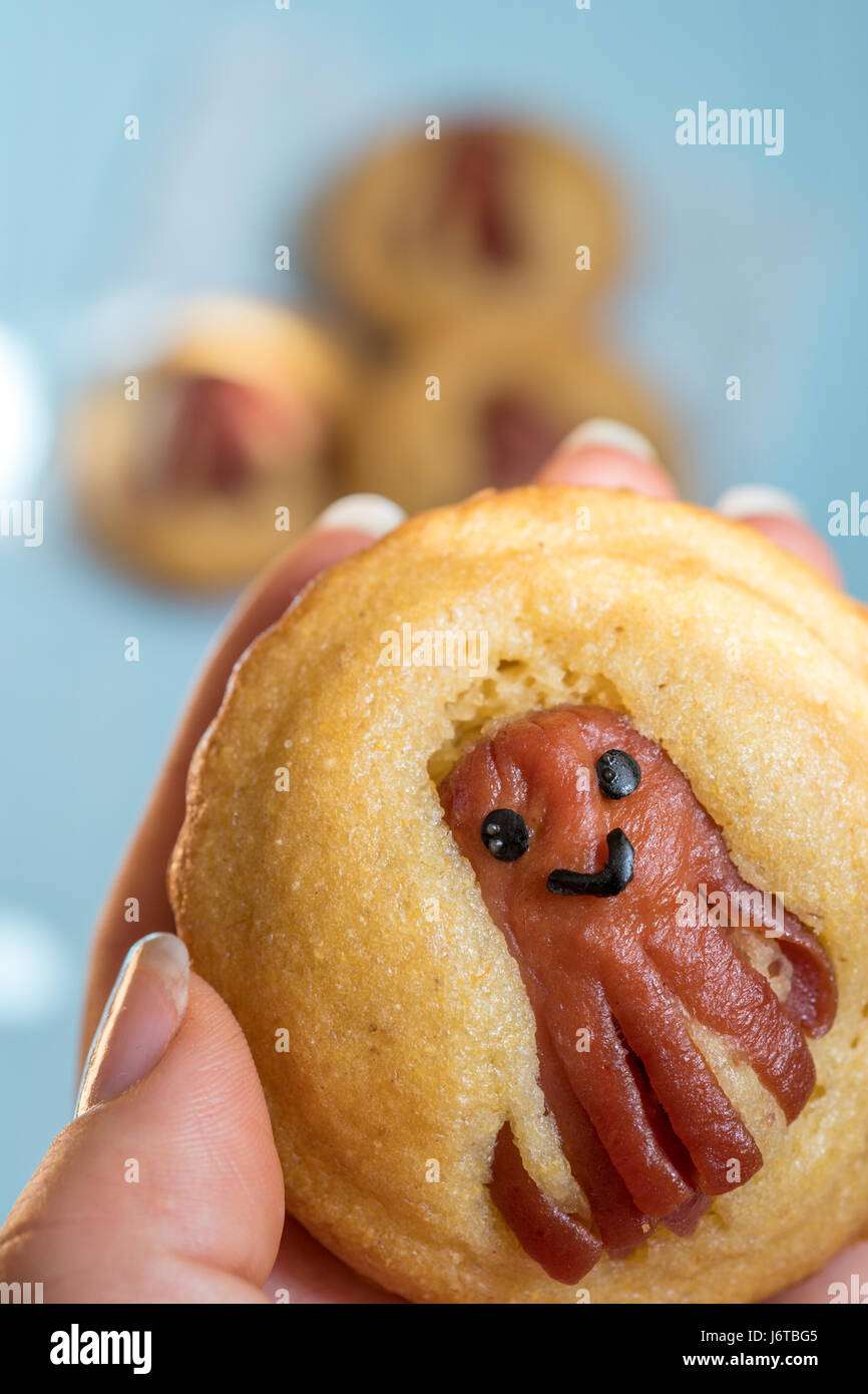 Kid funny food. Cornbread corn dogs muffins with cute octopus sausage ...