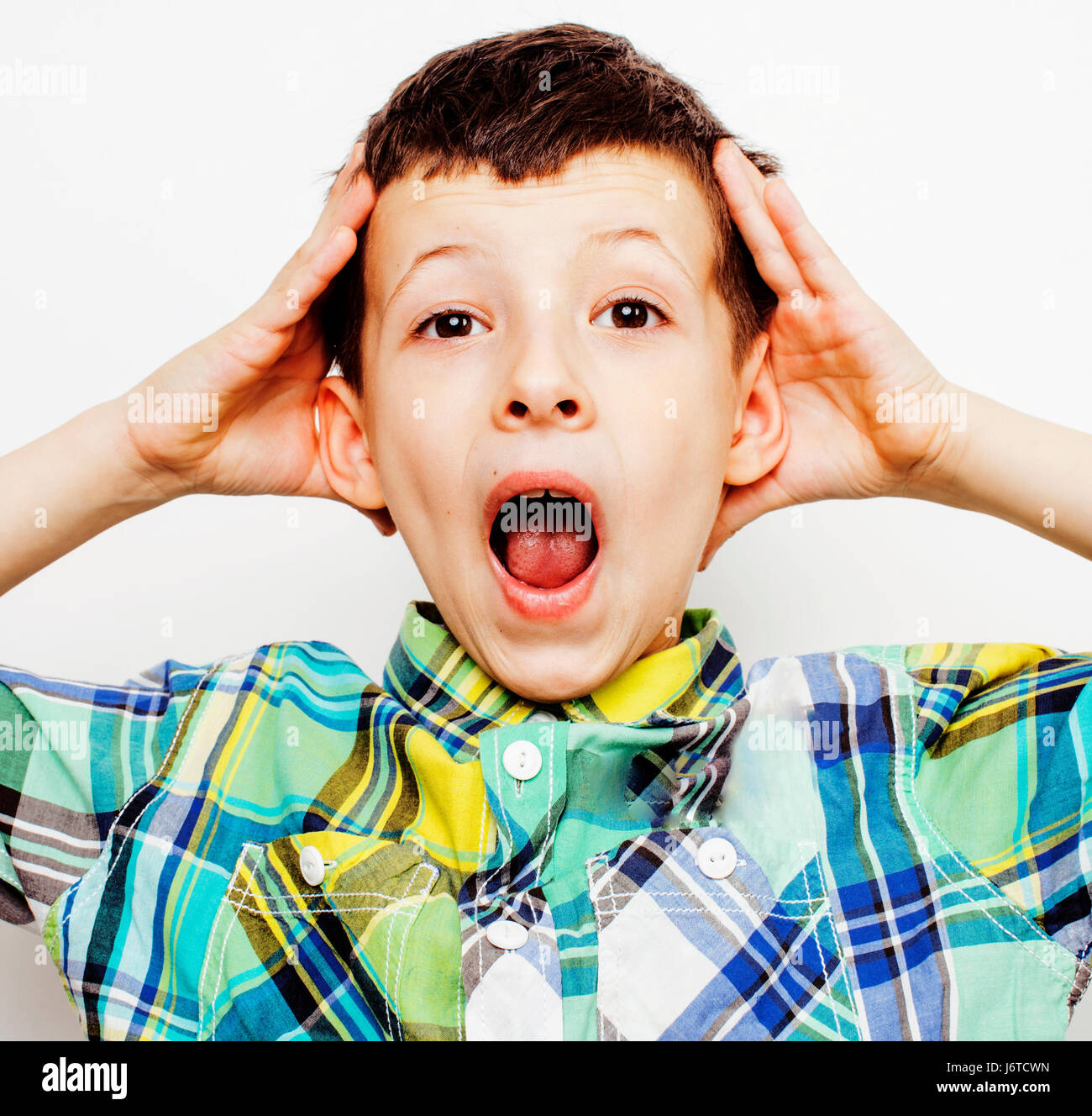 young pretty little cute boy kid wondering, posing emotional face ...