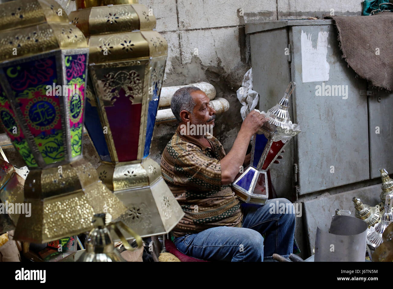 Cairo, Egypt. 1st May, 2017. An Egyptian worker manufactures a ...