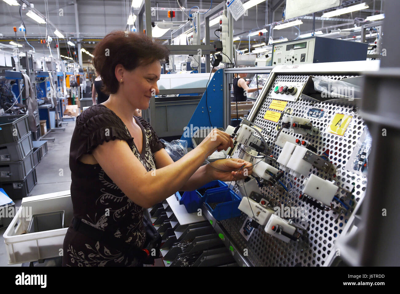 Production of company KES a producer of wiring harnesses for car lights ...