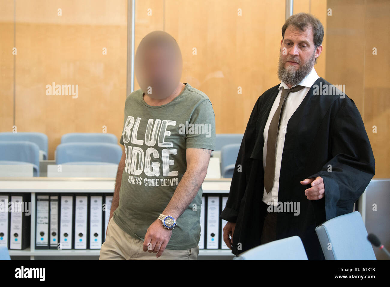 Defendant Ibrahim A. (L) next to his lawyer Martin Heising in a ...