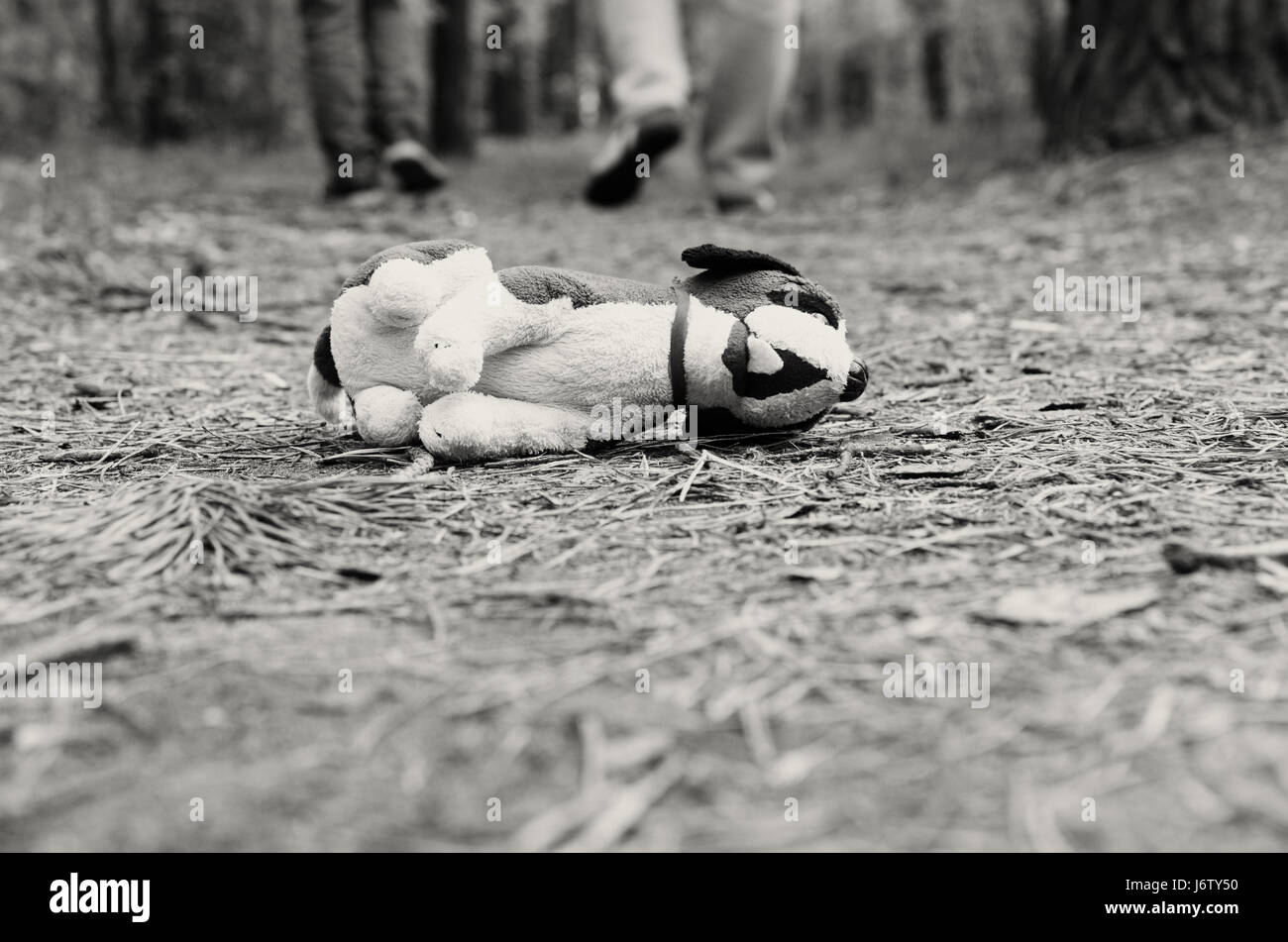 Missing child. Abandoned toy. Loneliness. Black and white image Stock ...