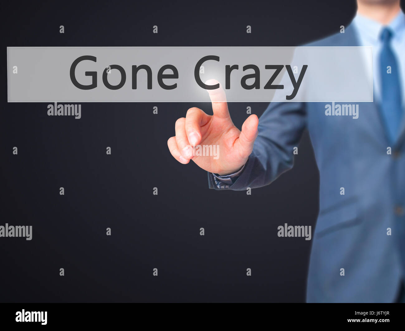 Gone Crazy - Businessman hand pressing button on touch screen interface ...