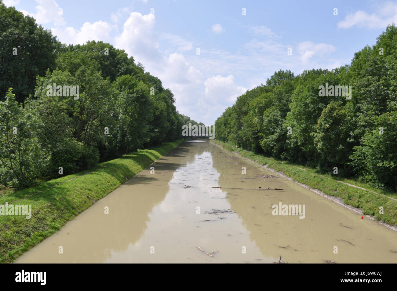 channel bavaria munich flood flotsam water blue tree trees green wood ...