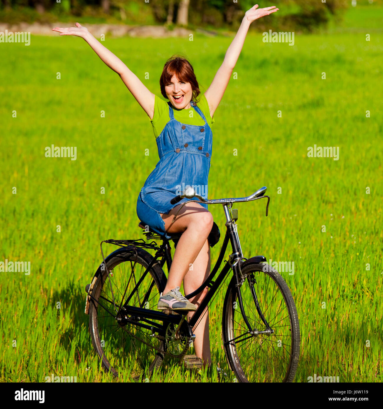 woman field spring bouncing bounces hop skipping frisks jumping jump ...
