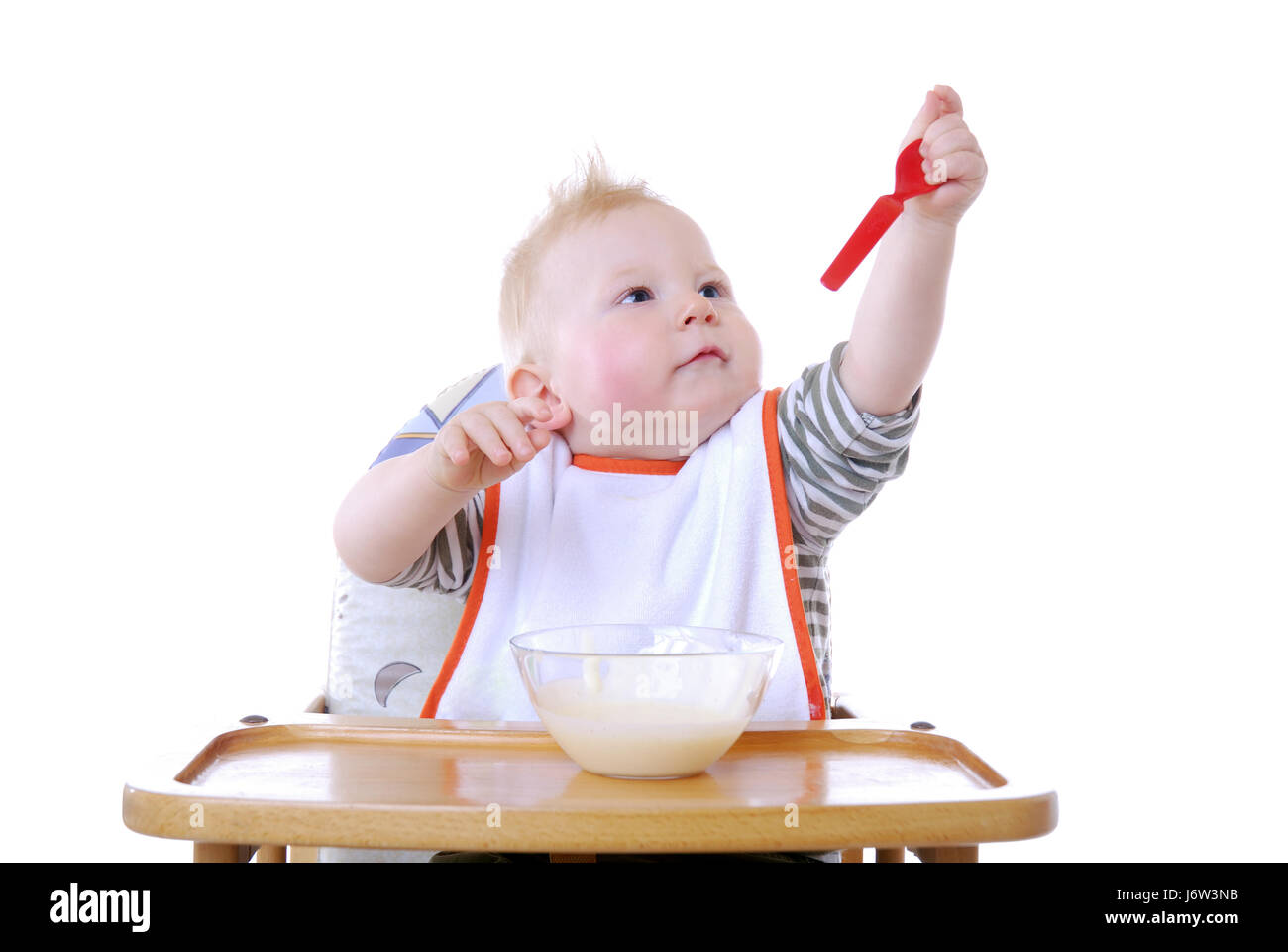 baby feed pap young younger child eating eat eats chair toddler studio ...