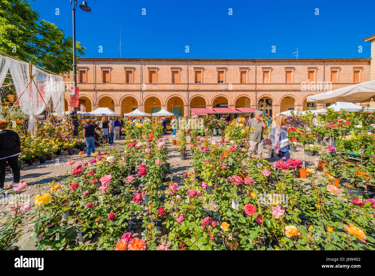 Flower fair in medieval village in Italy Stock Photo - Alamy