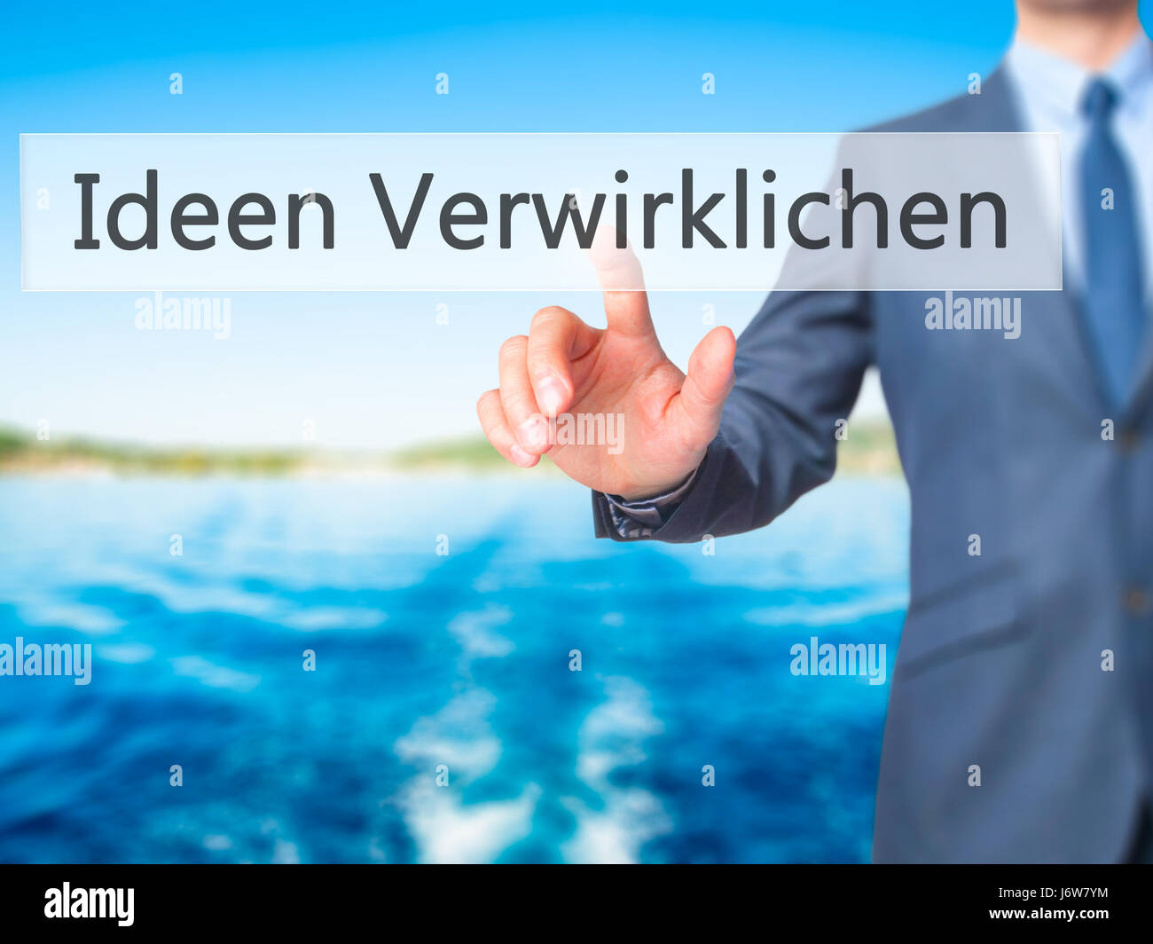 Ideen Verwirklichen ( Realize Ideas in German) - Businessman hand ...