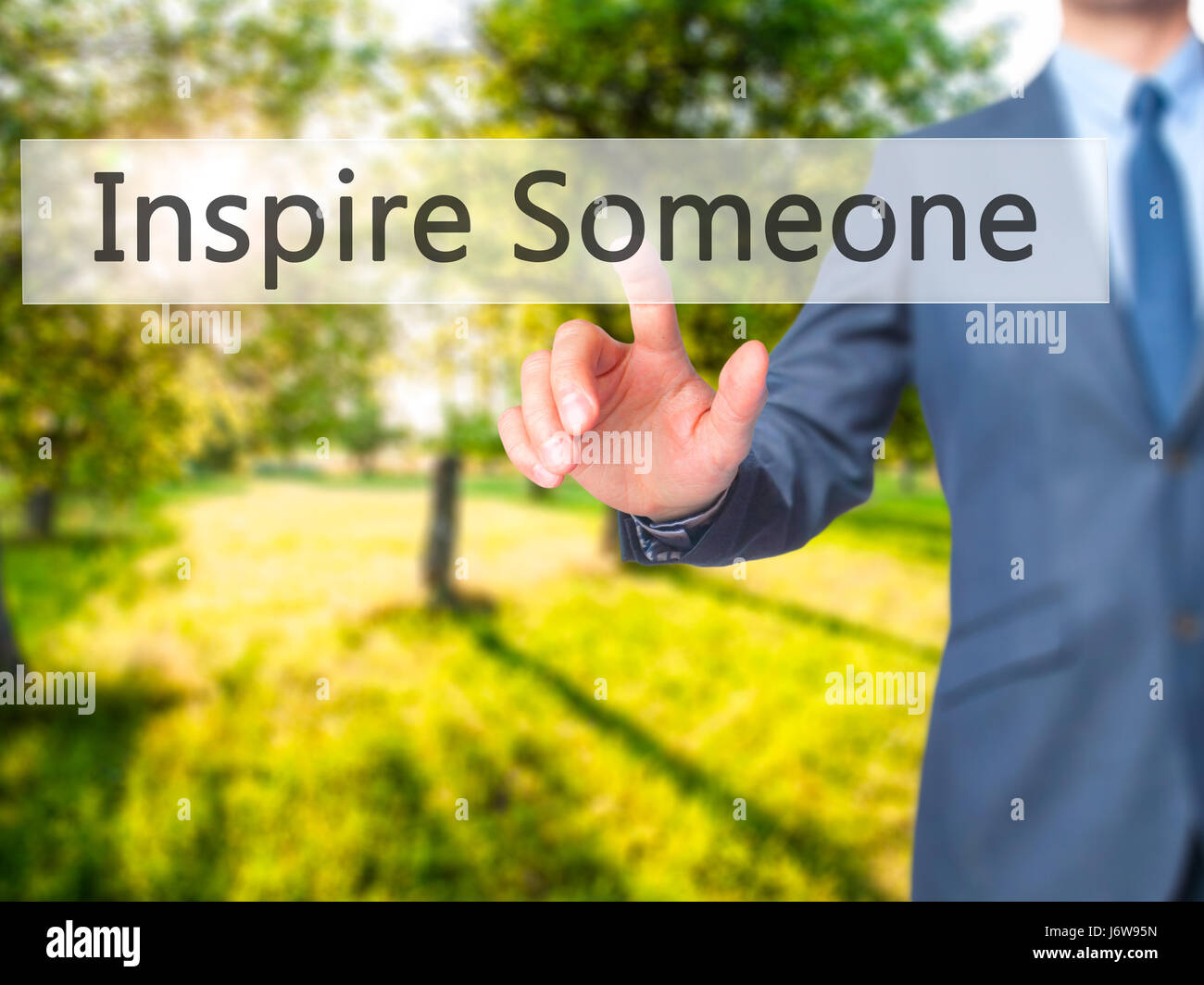 Inspire Someone - Businessman hand pressing button on touch screen ...